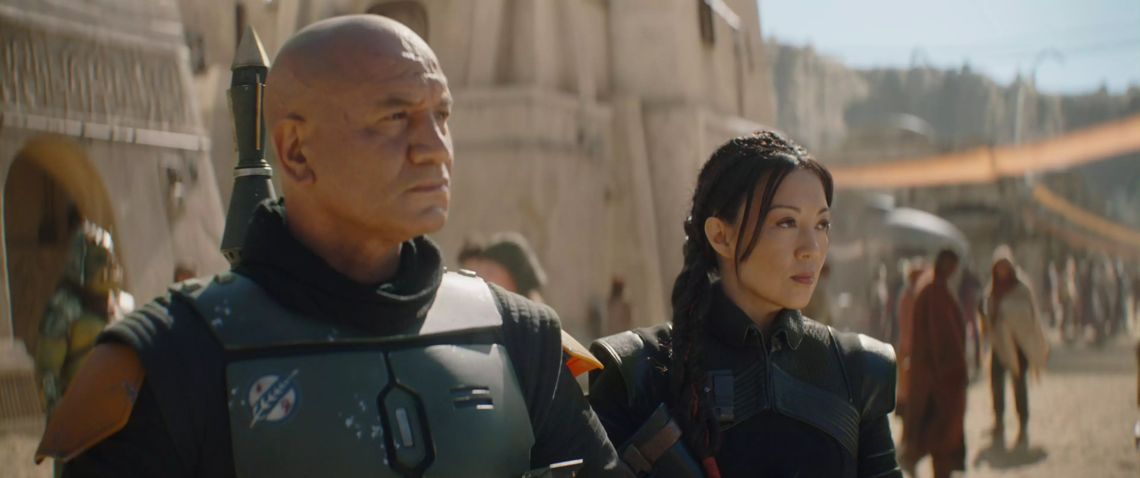 l r temura morrison is boba fett and ming na wen is fennec shand in lucasfilm's the book of boba fett, only on disney © 2021 lucasfilm ltd ™ all rights reserved