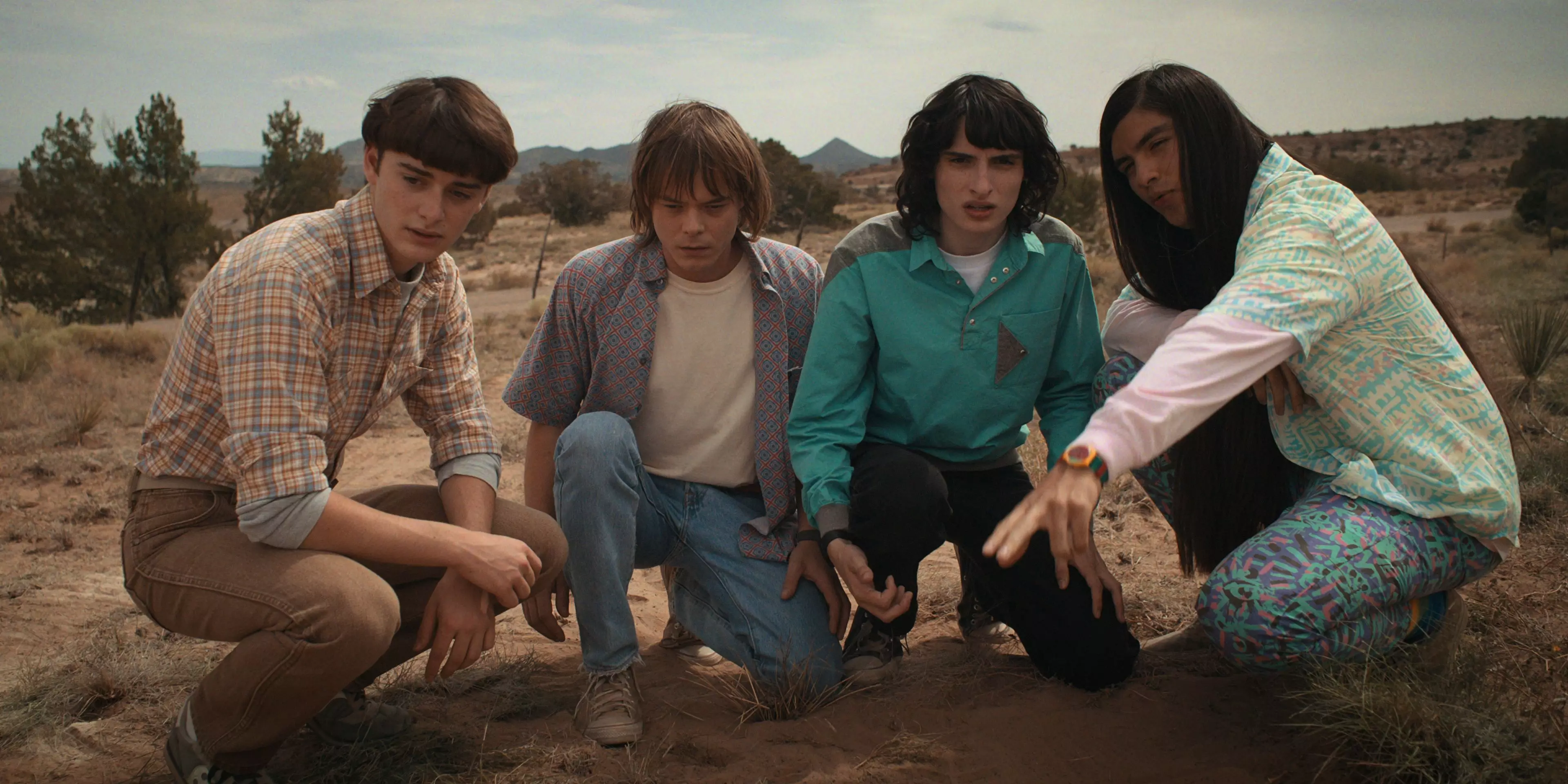 stranger things l to r noah schnapp as will byers, charlie heaton as jonathan byers, finn wolfhard as mike wheeler, and eduard franc as argyle in stranger things cr courtesy of netflix © 2022