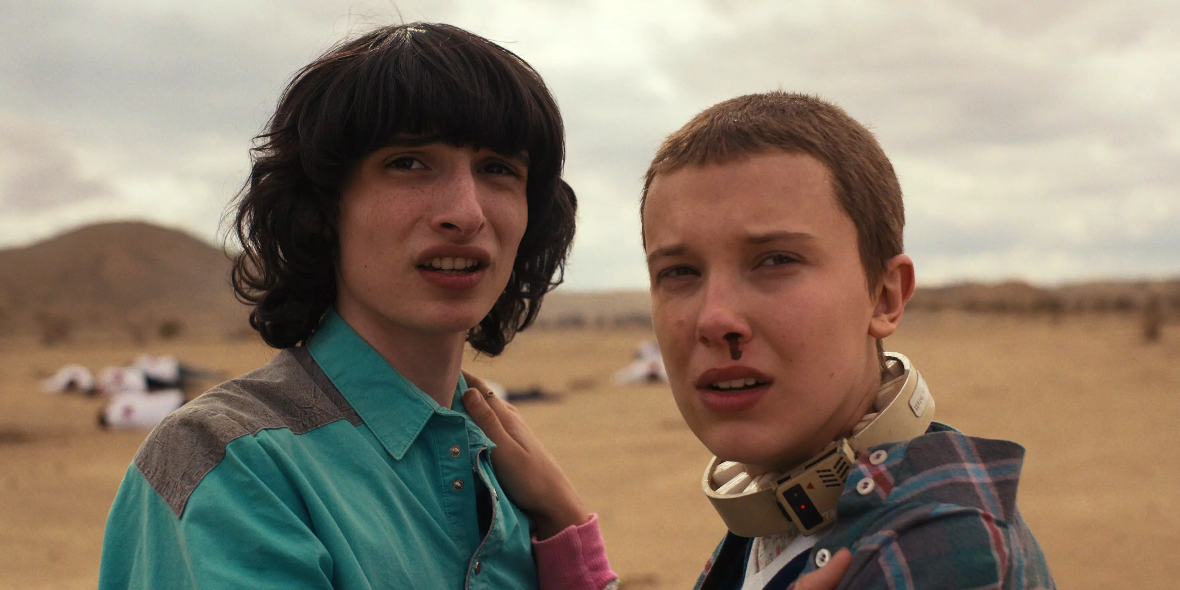 stranger things l to r finn wolfhard as mike wheeler and millie bobby brown as sabelas in stranger things cr kahadean tina netflix © 2022