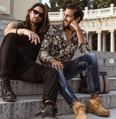 luca onestini and gianmarco onestini sitting posing on some stairs