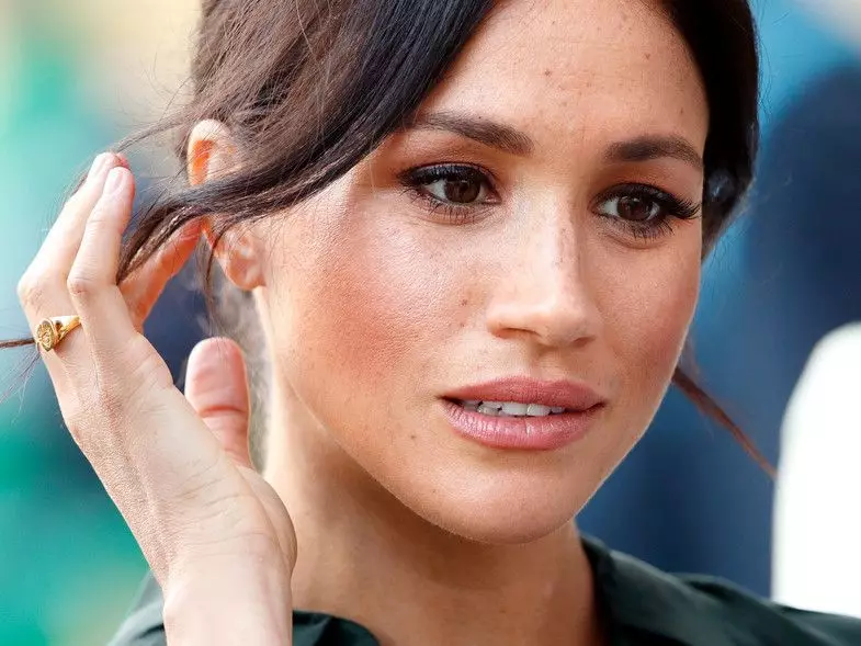 meghan markle reappears very thoughtful during a public act