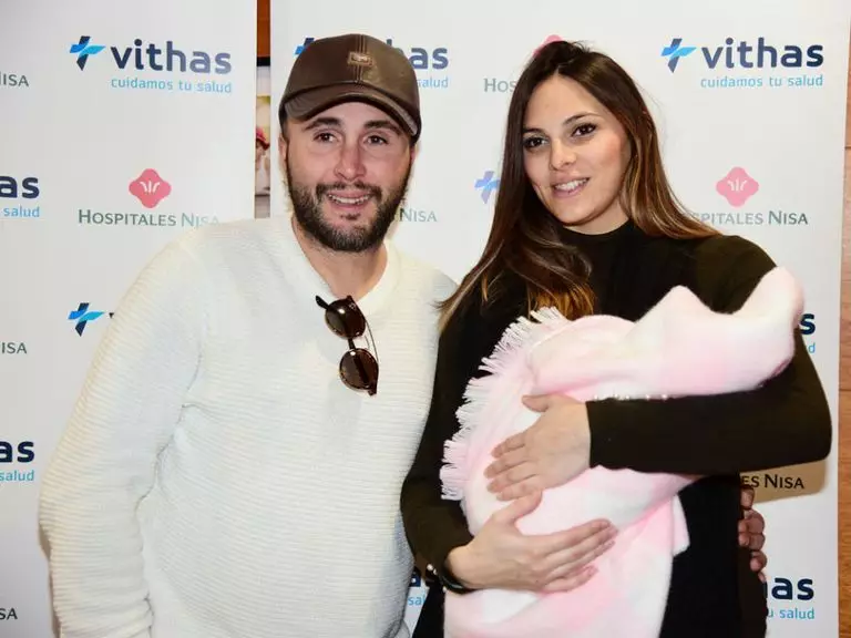 kiko rivera and irene rosales posing with their daughter carlota