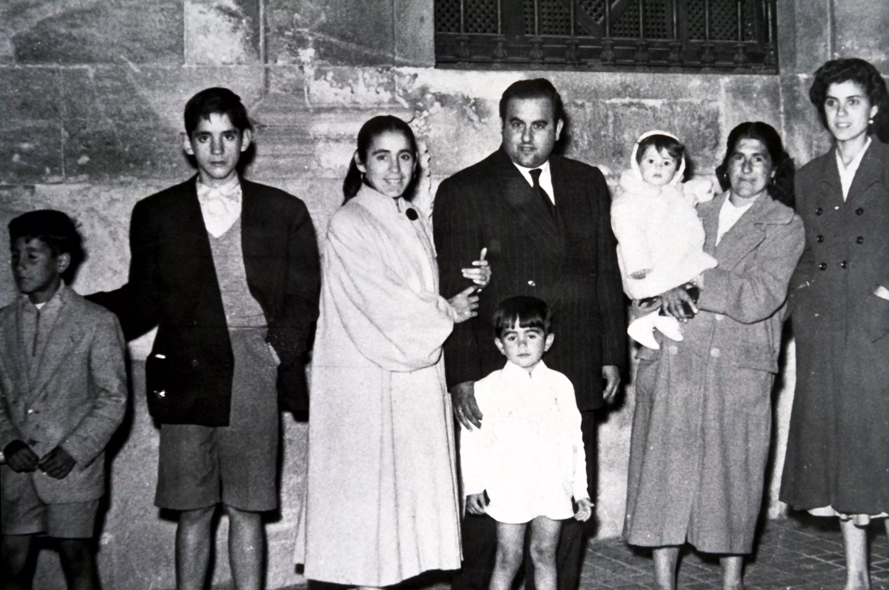 the pantoja family posing in a black and white photo