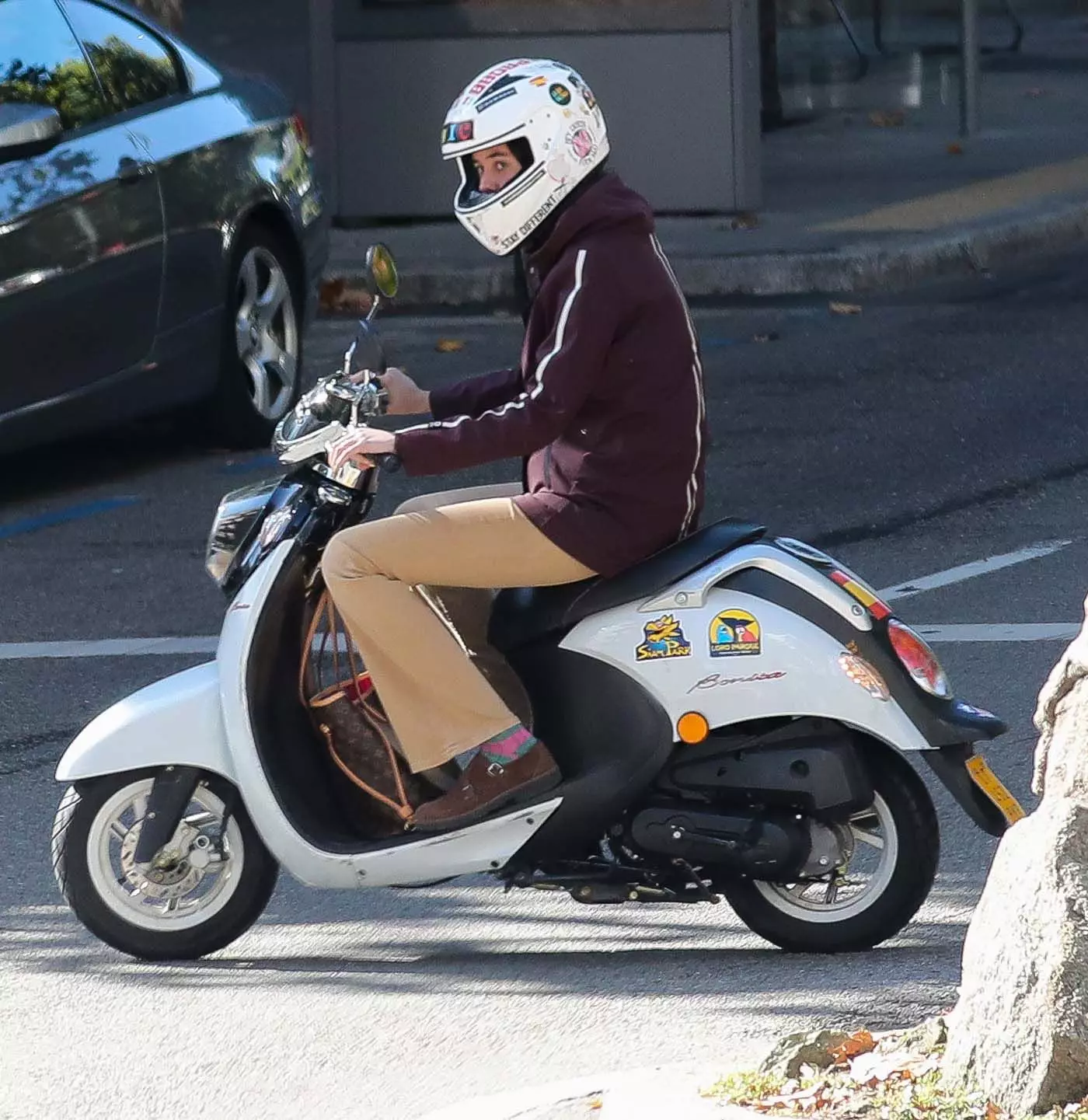 Victoria Federica rides a motorcycle through the streets of Madrid