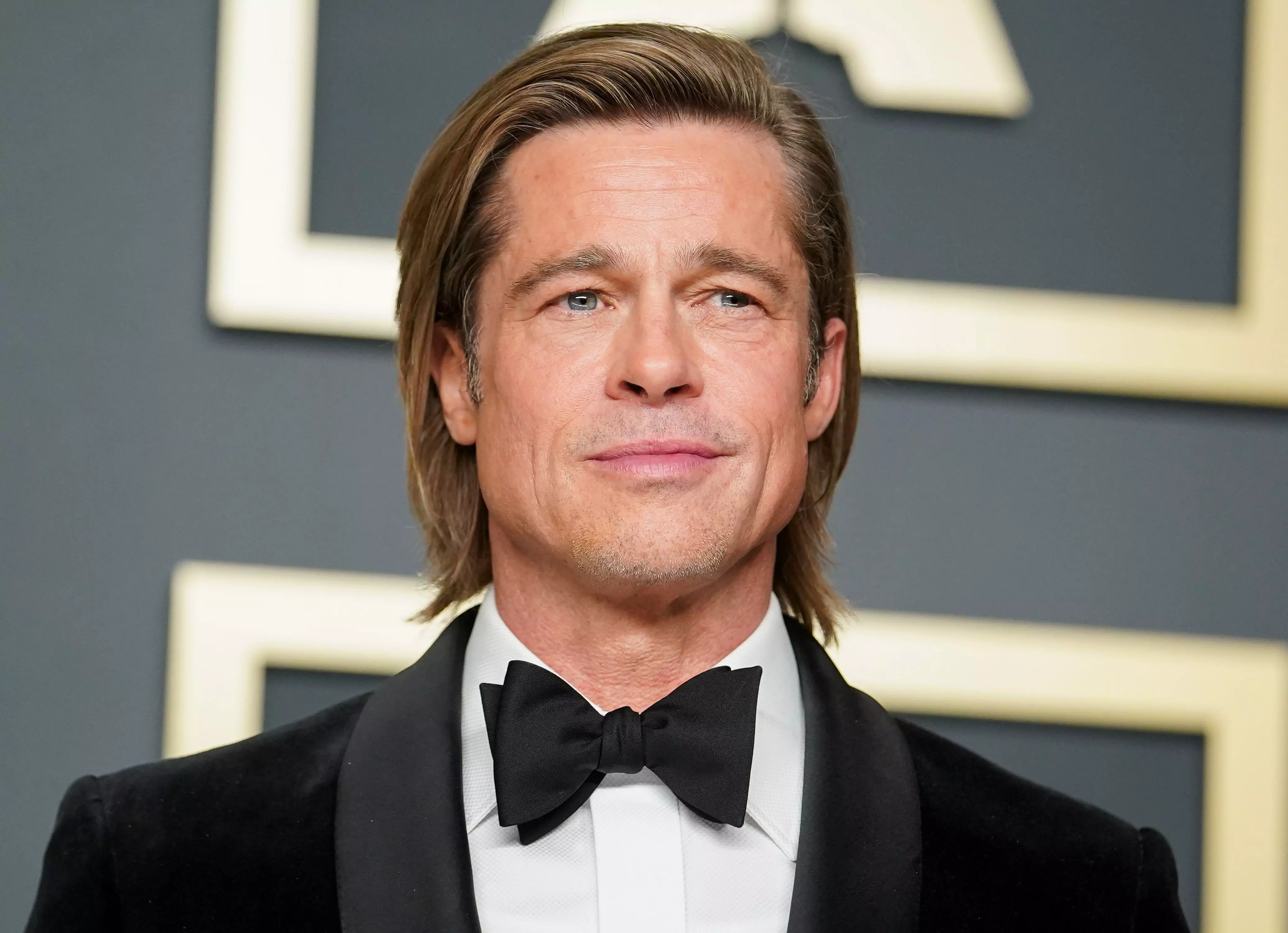 Brad Pitt's "lub ntsej muag dig muag" yog dab tsi?