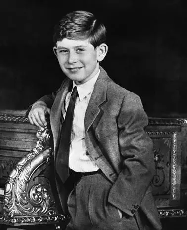 prince charles as a child posing in a black and white photo